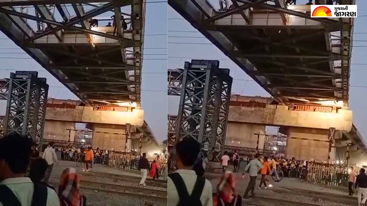 કીમમાં રેલવે ઓવરબ્રીજની કામગીરીમાં વેલ્ડિંગના તિખારા નીચેથી પસાર થતા ...